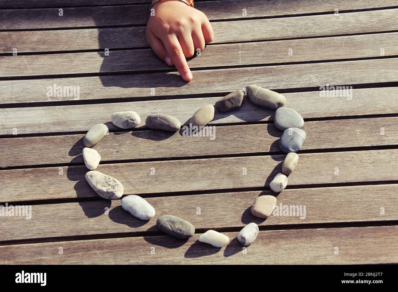 A Heart shape Made by stones Stock Photo - Alamy