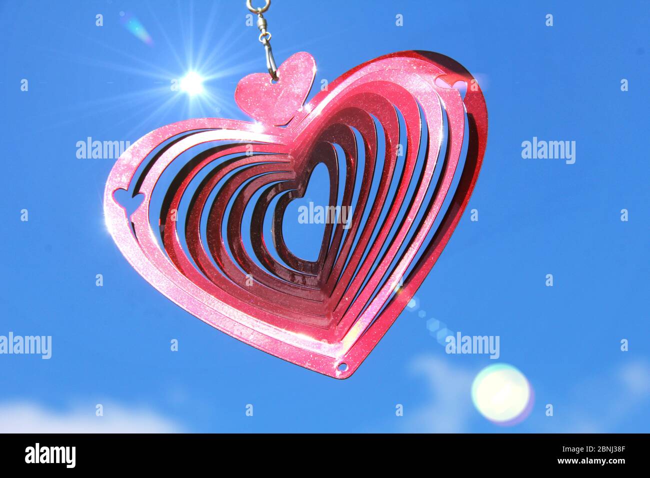 heart shape in the sun ray Stock Photo - Alamy