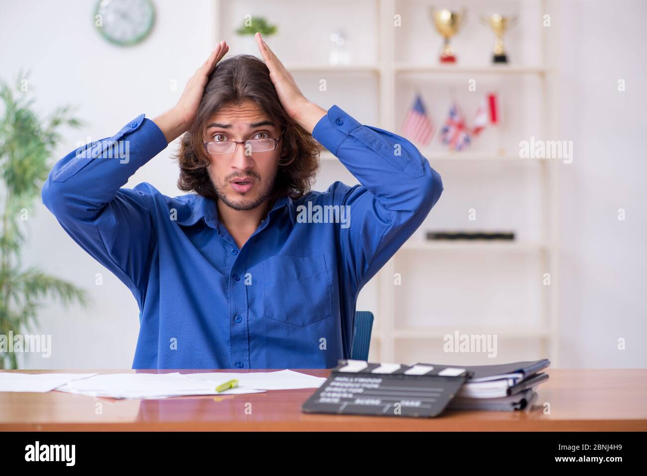 Movie director working in studio Stock Photo - Alamy