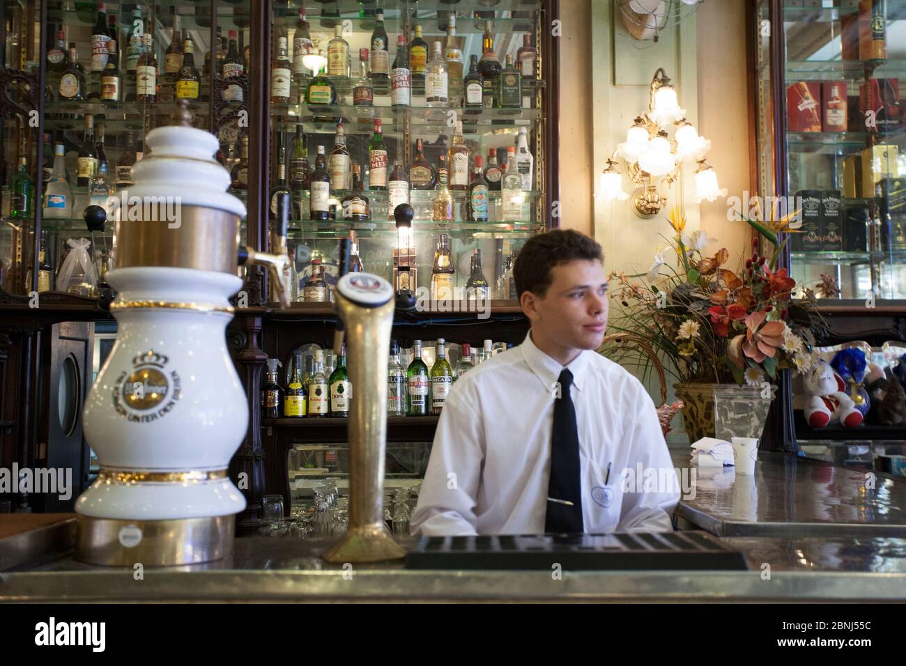 A bar man in a traditional boteco bar in central Rio de Janeiro, Brazil ...