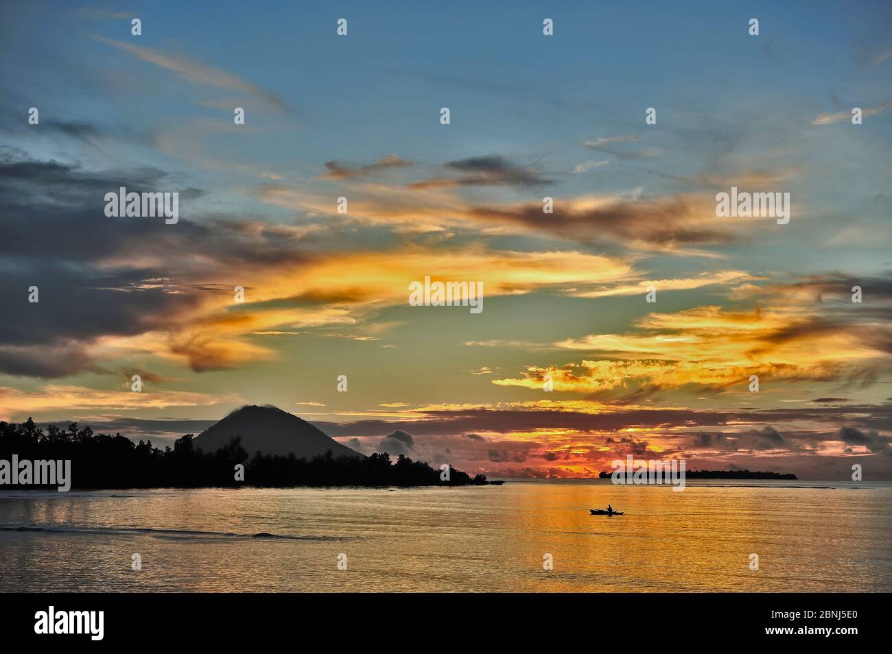 Sunset on the volcano island of Manado Tua, Manado, Indonesia, Sulawesi ...