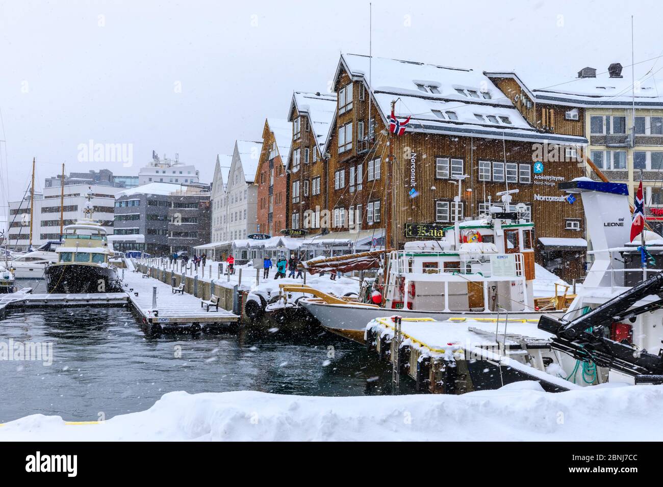 Tromso small boat harbour, heavy snow in winter, Tromso, Troms og ...