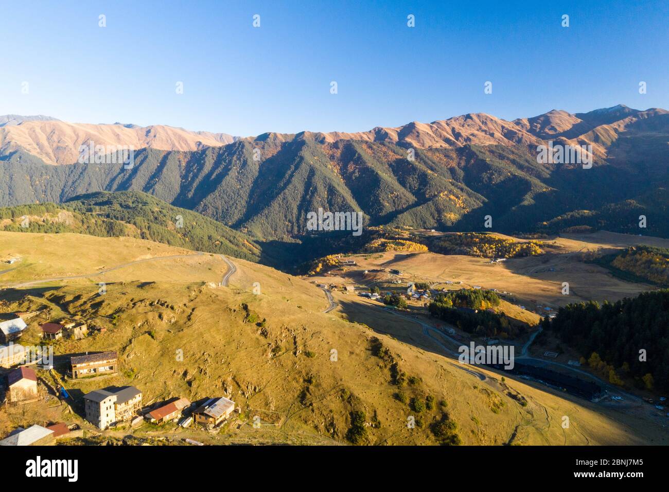 Caucasus, Georgia, Tusheti region, Shenako. Aerial view of the village ...