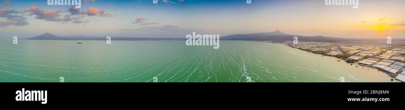 Aerial panoramic of Lake Afrera (Lake Afdera) and salt flats tanks ...