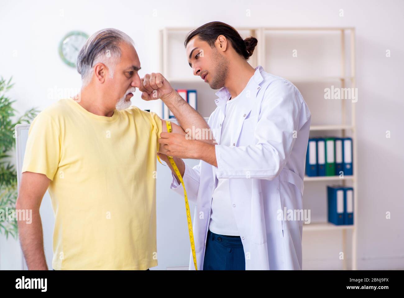 The doctor dietician giving advices to fat overweight patient Stock ...