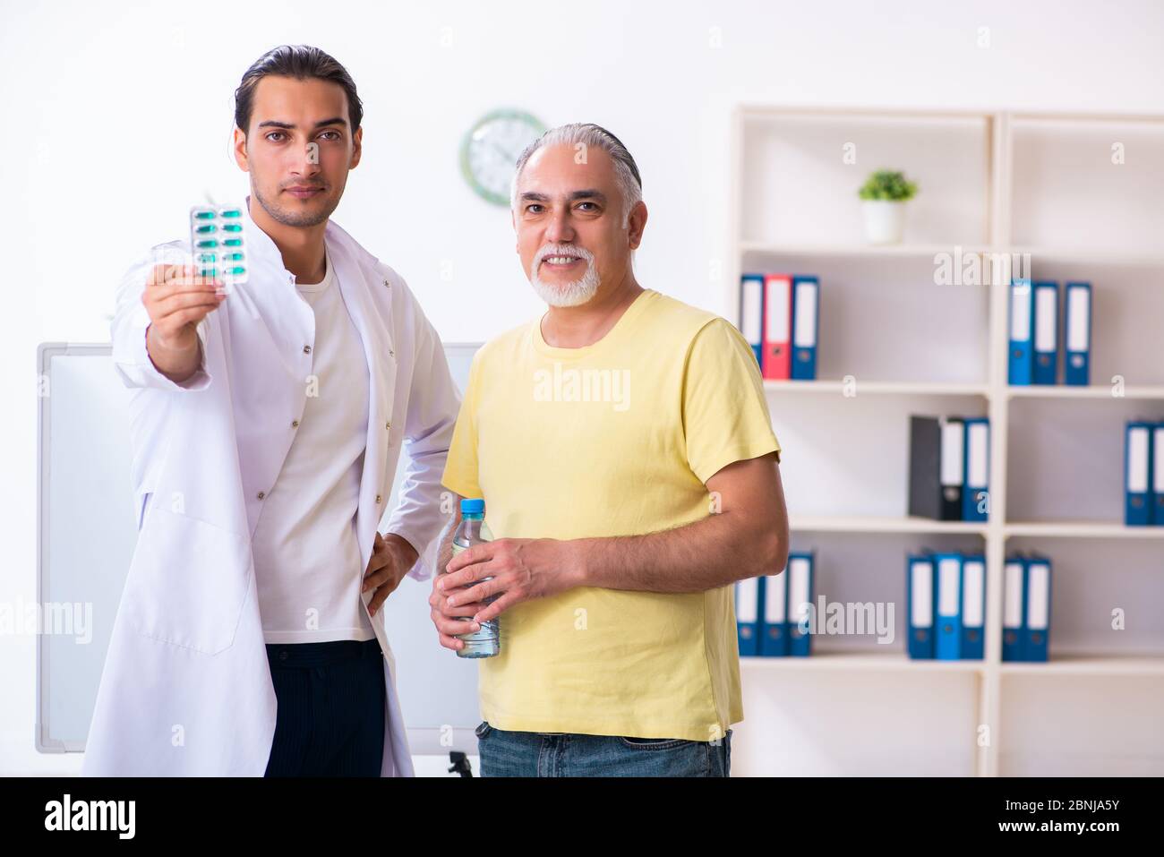 The doctor dietician giving advices to fat overweight patient Stock ...