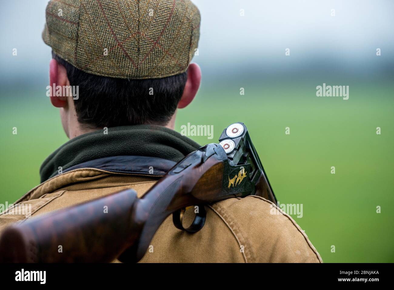 Man carrying gun over shoulder hi-res stock photography and images - Alamy