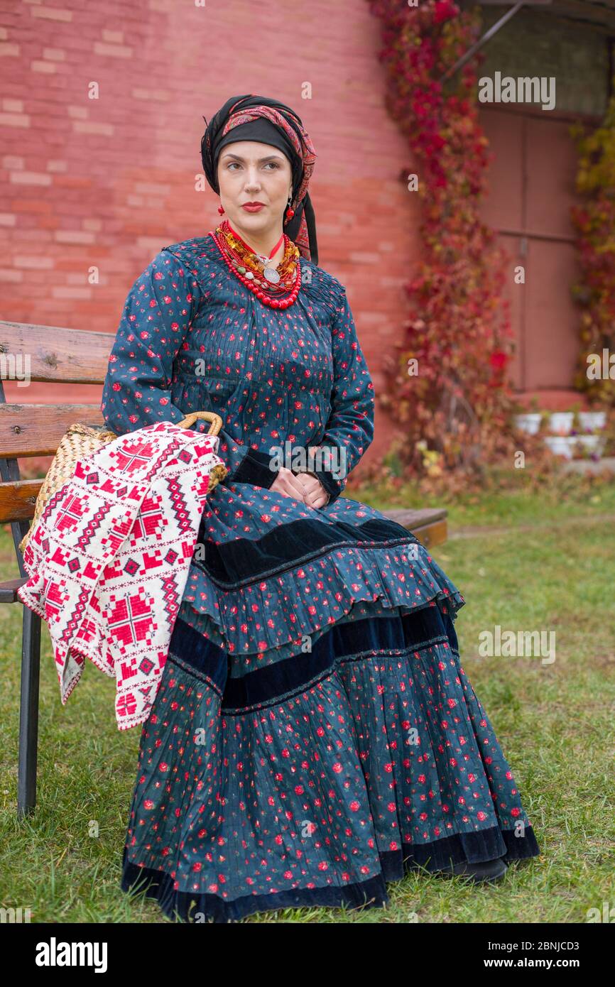 Woman with a basket in retro clothes of the 19th century. Antique ...