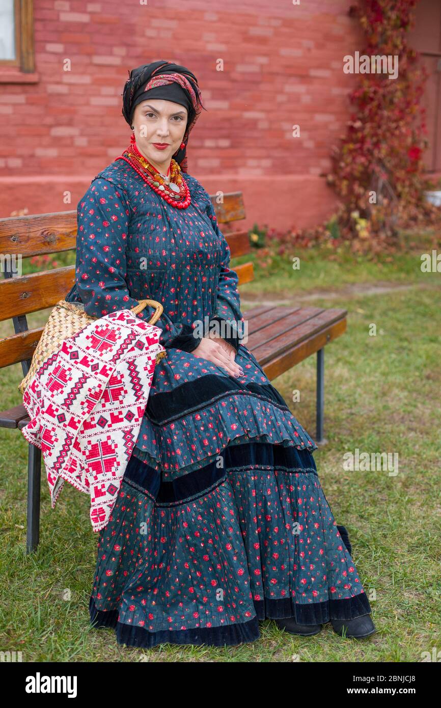 Woman with a basket in retro clothes of the 19th century. Antique ...
