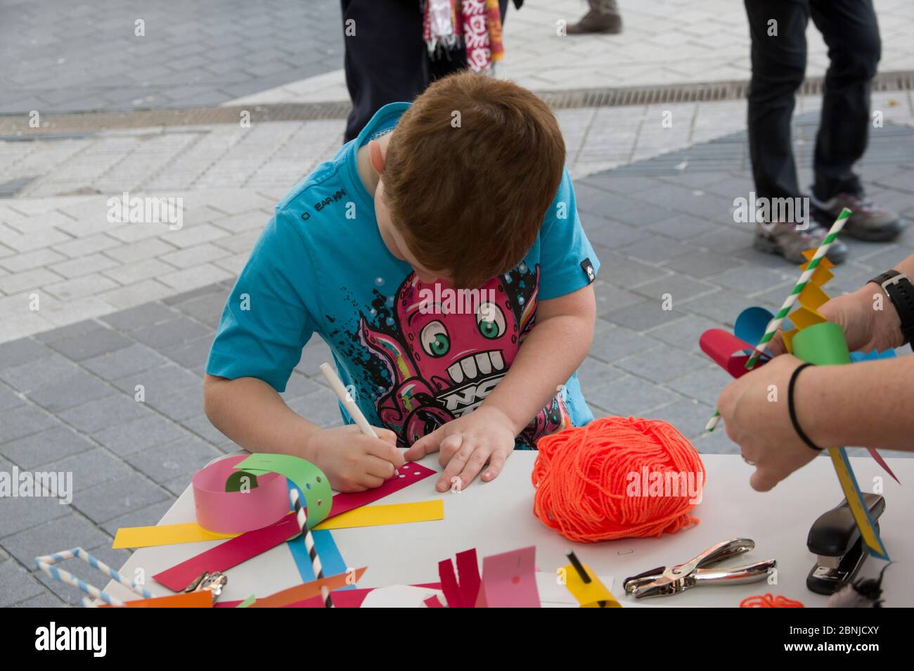 Creative activities for children involving cutting and folding colorful ...