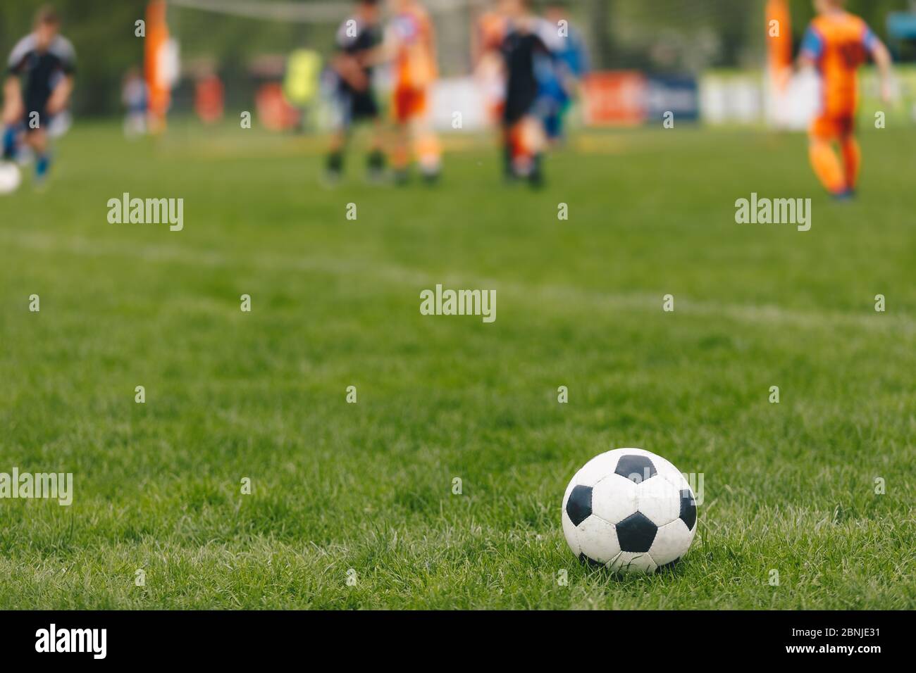 Sports outdoor background. Soccer ball on the field. Football ...
