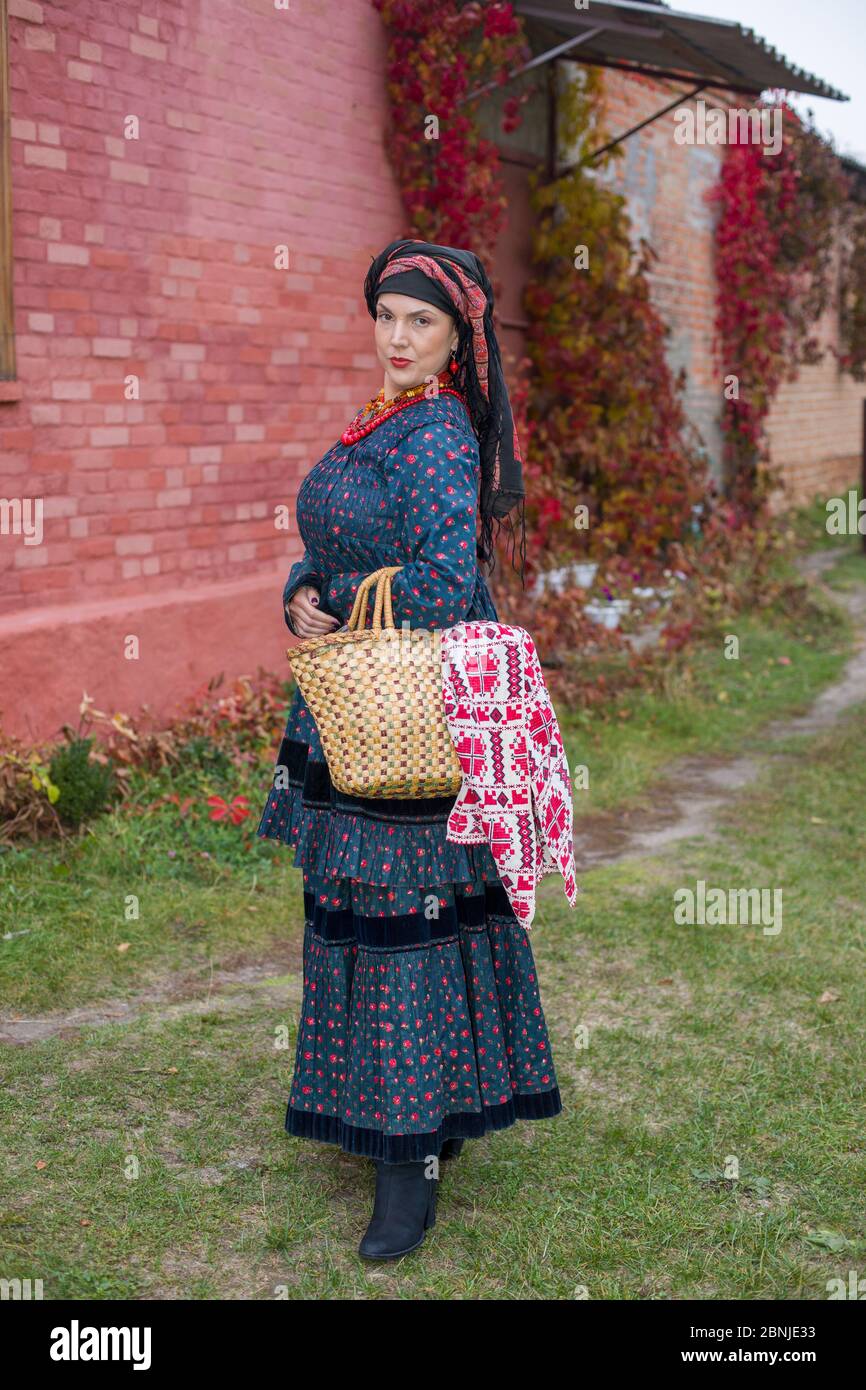 Woman with a basket in retro clothes of the 19th century. Antique ...