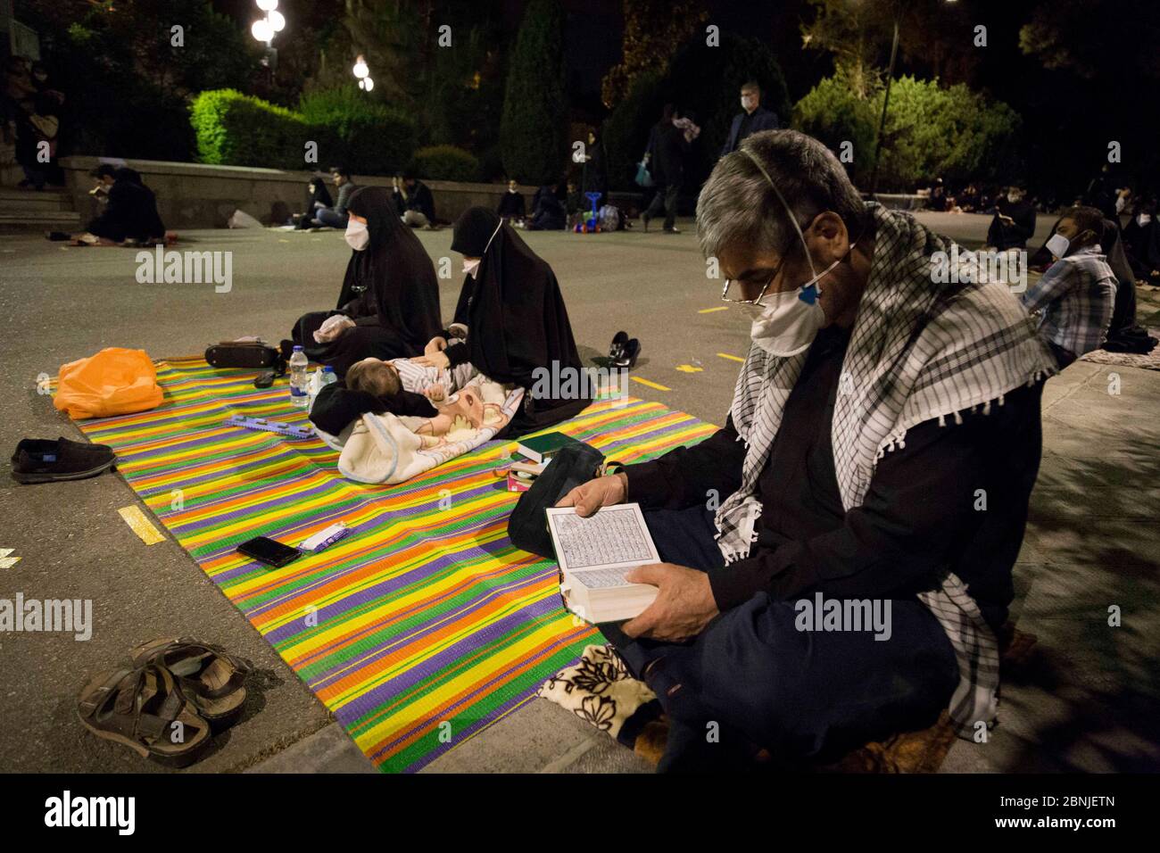 May 14, 2020, Tehran, Iran: Iranians wearing face masks pray during a ...