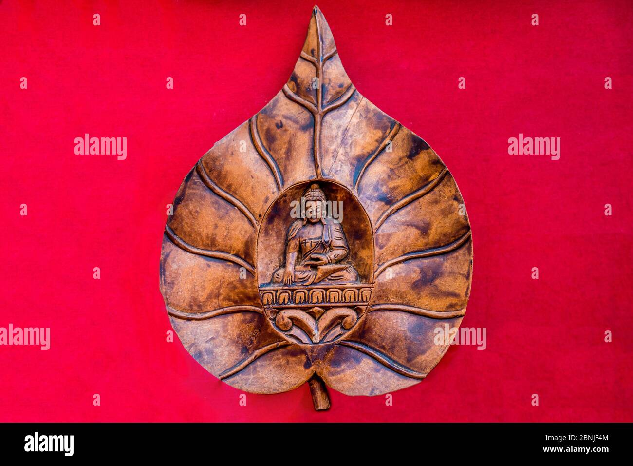 Beautiful Buddha Statue Figure on Leaf. Buddha Statue Sculpture on red ...
