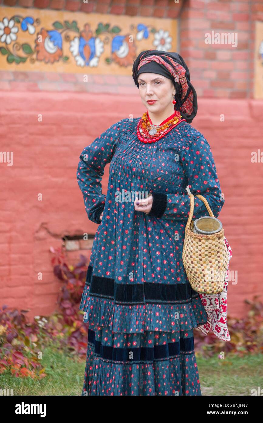 Woman with a basket in retro clothes of the 19th century. Antique ...
