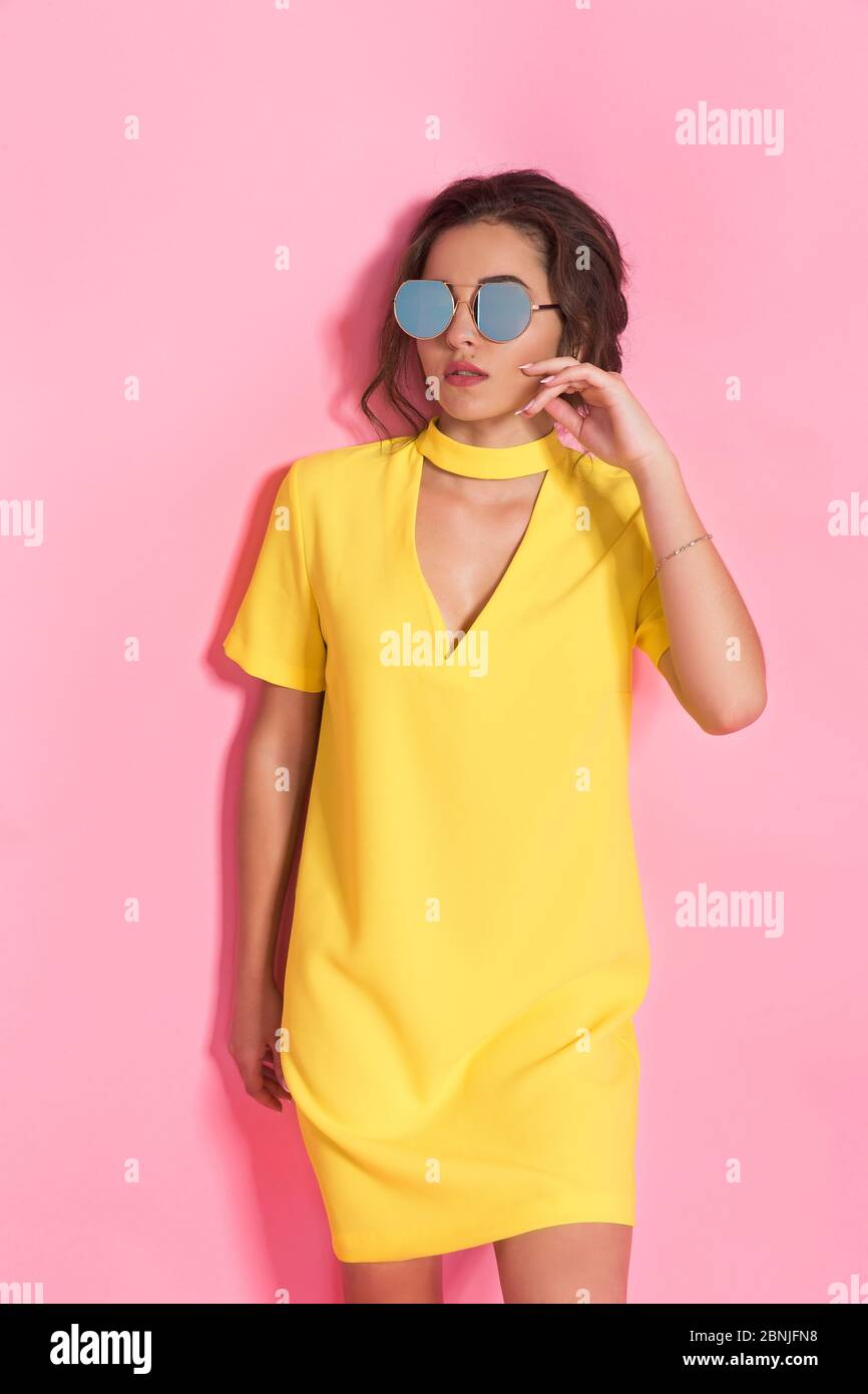 Women wearing bright summer clothes hi-res stock photography and images ...