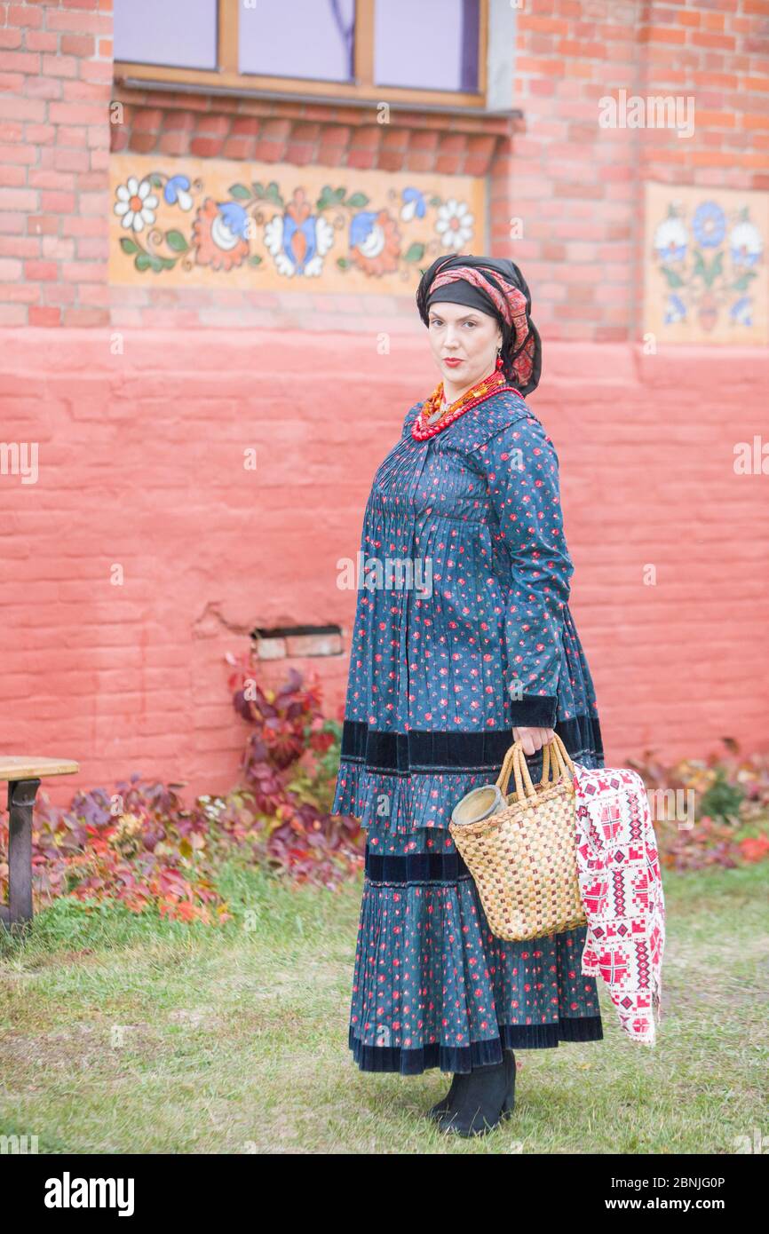 Woman with a basket in retro clothes of the 19th century. Antique ...
