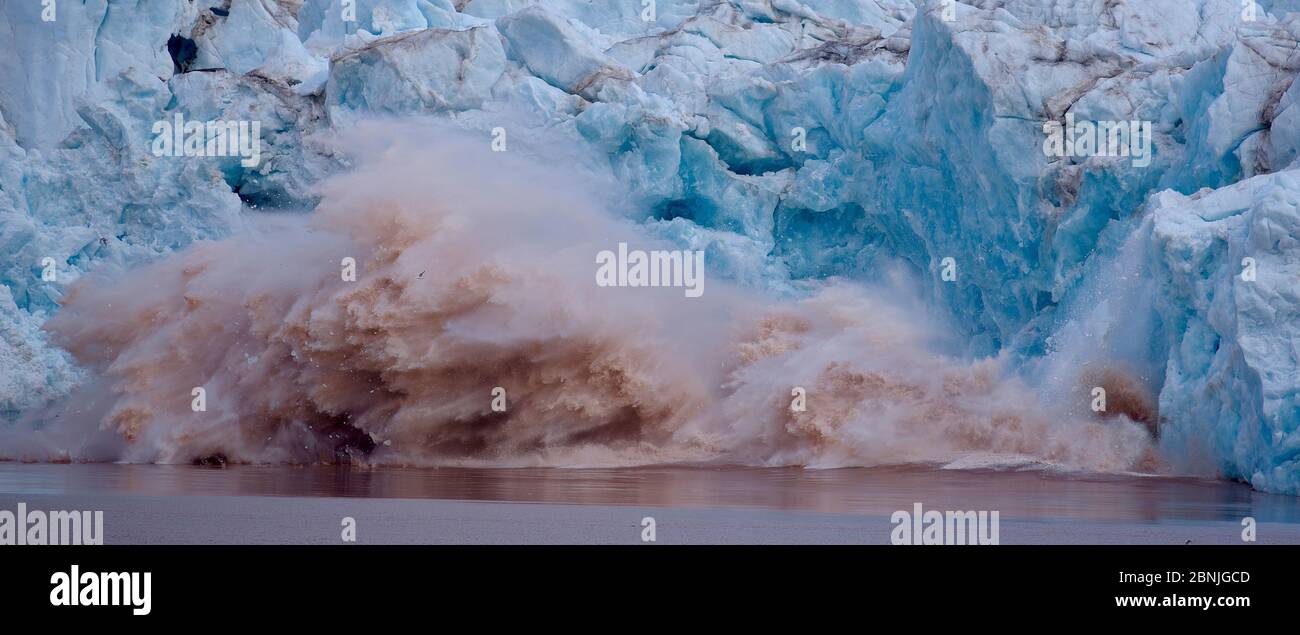 Ice falling from glacier into water, Svalbard, Norway, July Stock Photo ...