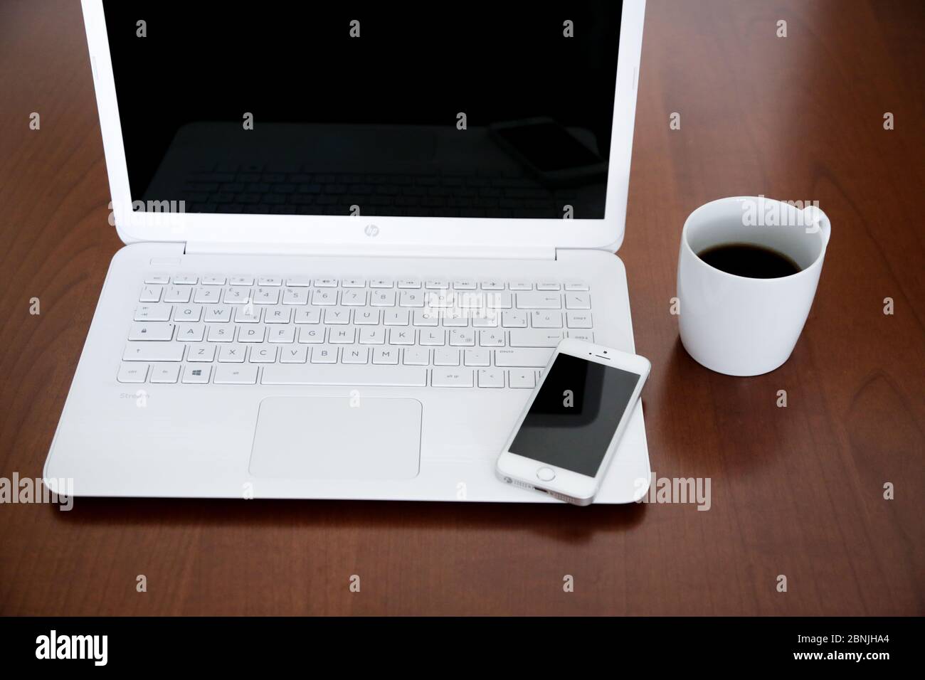 Working from home family devices hi-res stock photography and images ...