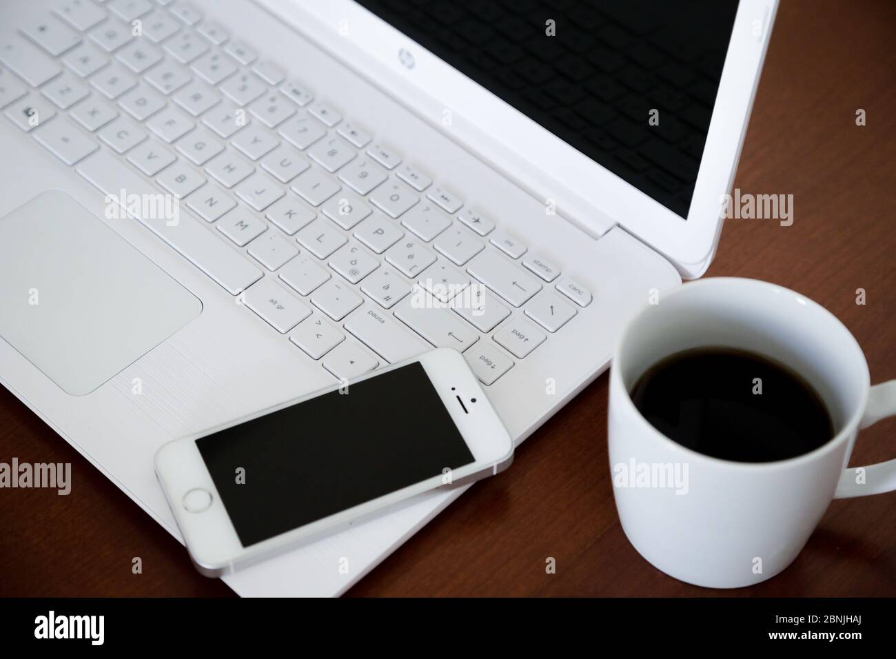 Working from home family devices hi-res stock photography and images ...