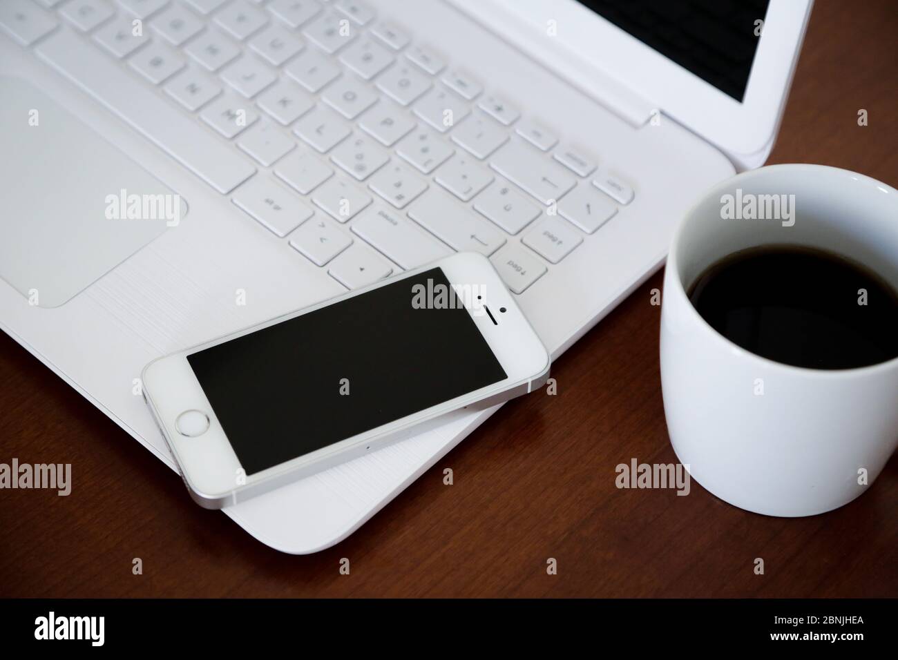 Working from home family devices hi-res stock photography and images ...