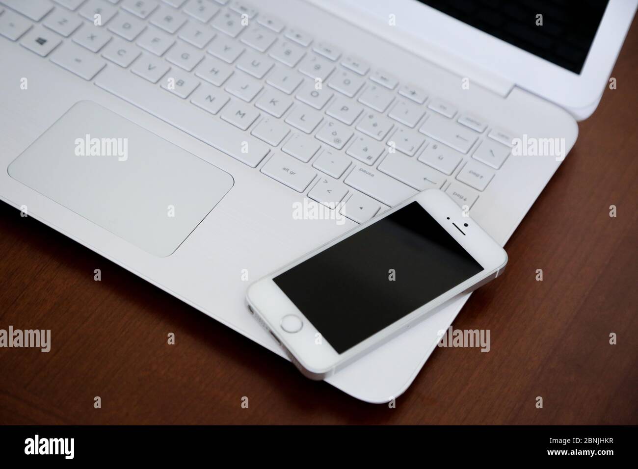 Working from home family devices hi-res stock photography and images ...