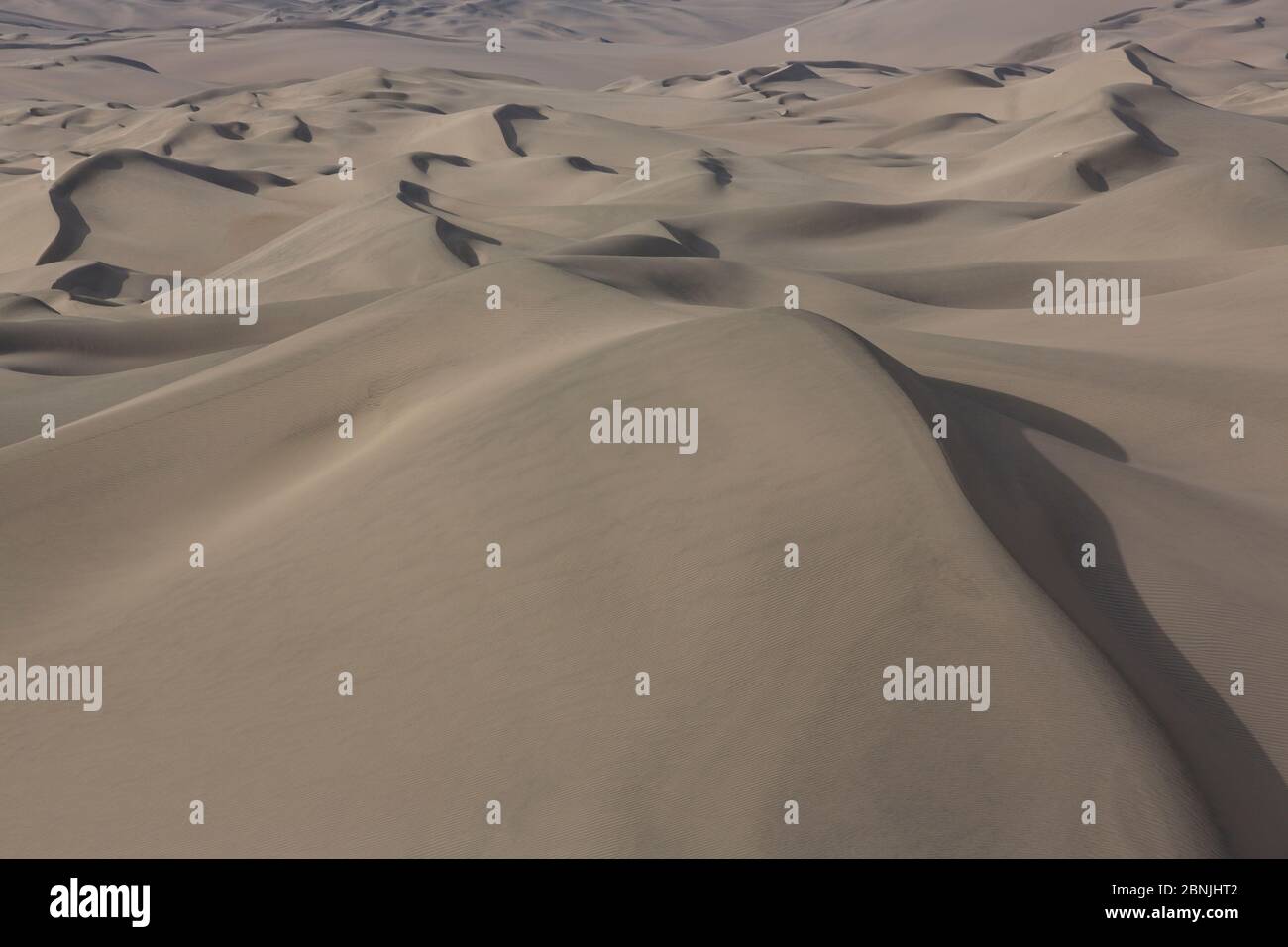 Aerial view of Nazca coastal desert with sand dunes in San Fernando ...