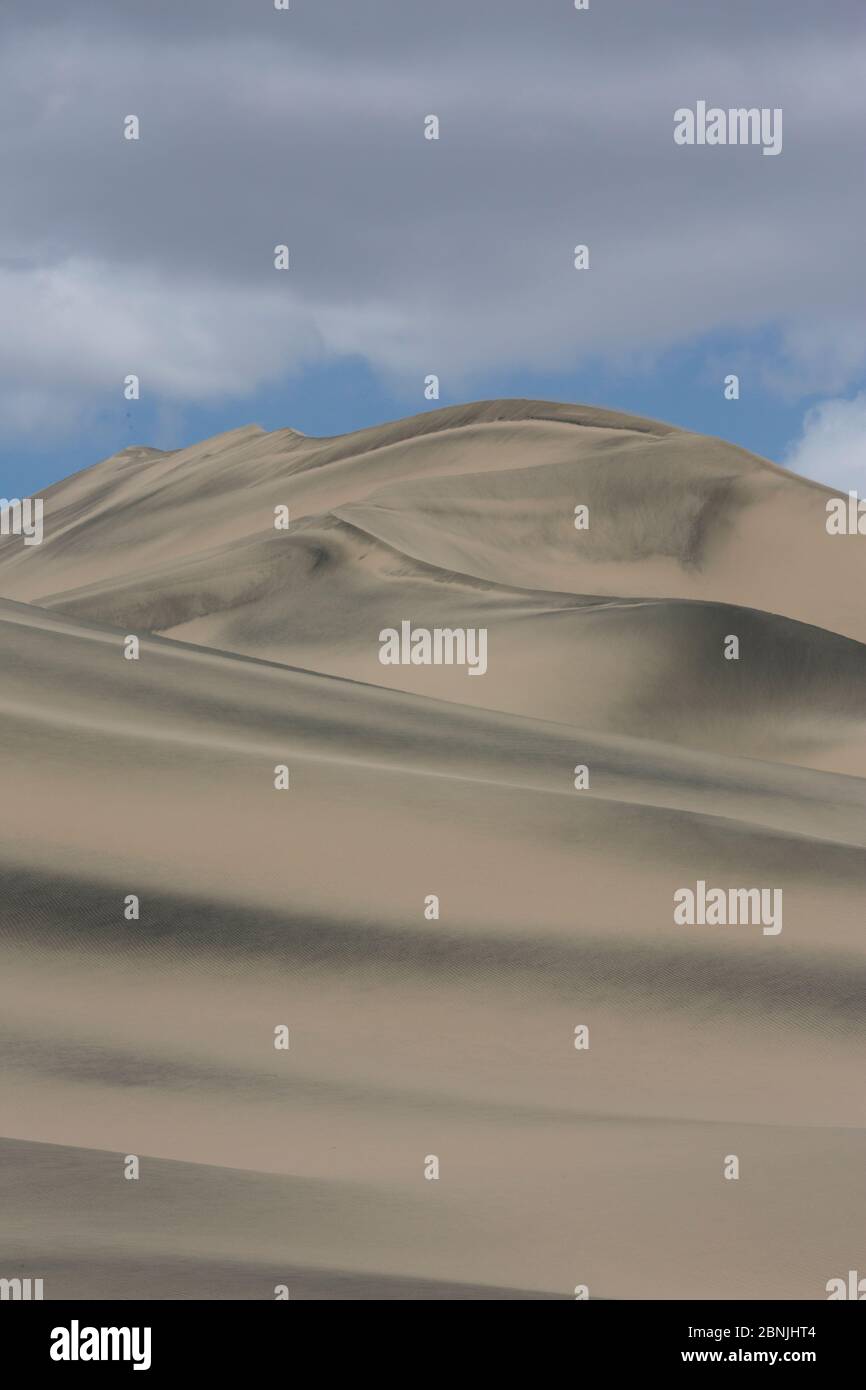 Aerial view of Nazca coastal desert with sand dunes in Paracas National ...