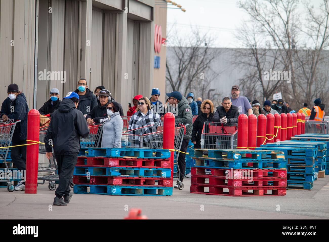 Long line outside of Costco in Toronto during Covid-19 Stock Photo - Alamy