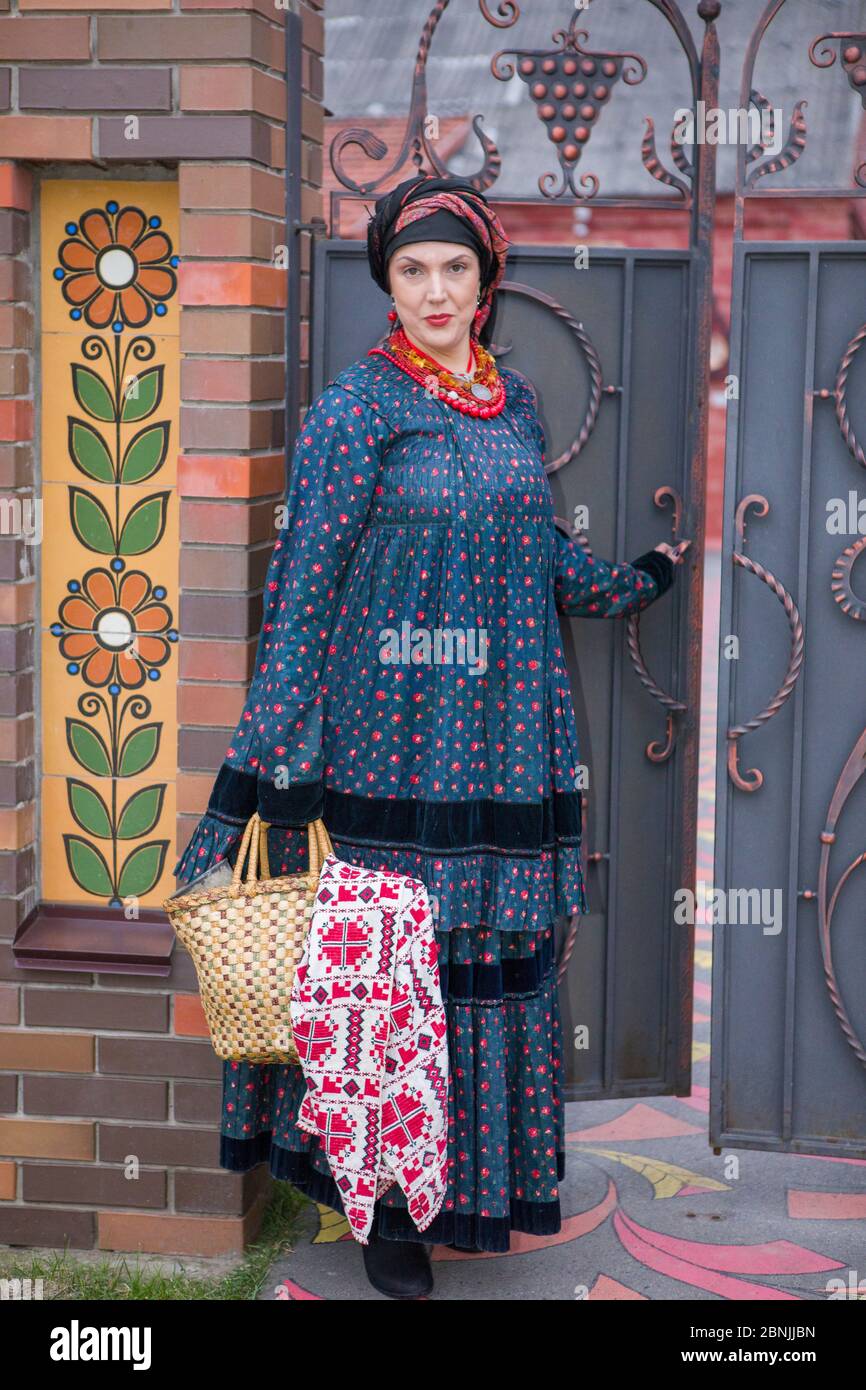 Woman with a basket in retro clothes of the 19th century. Antique ...