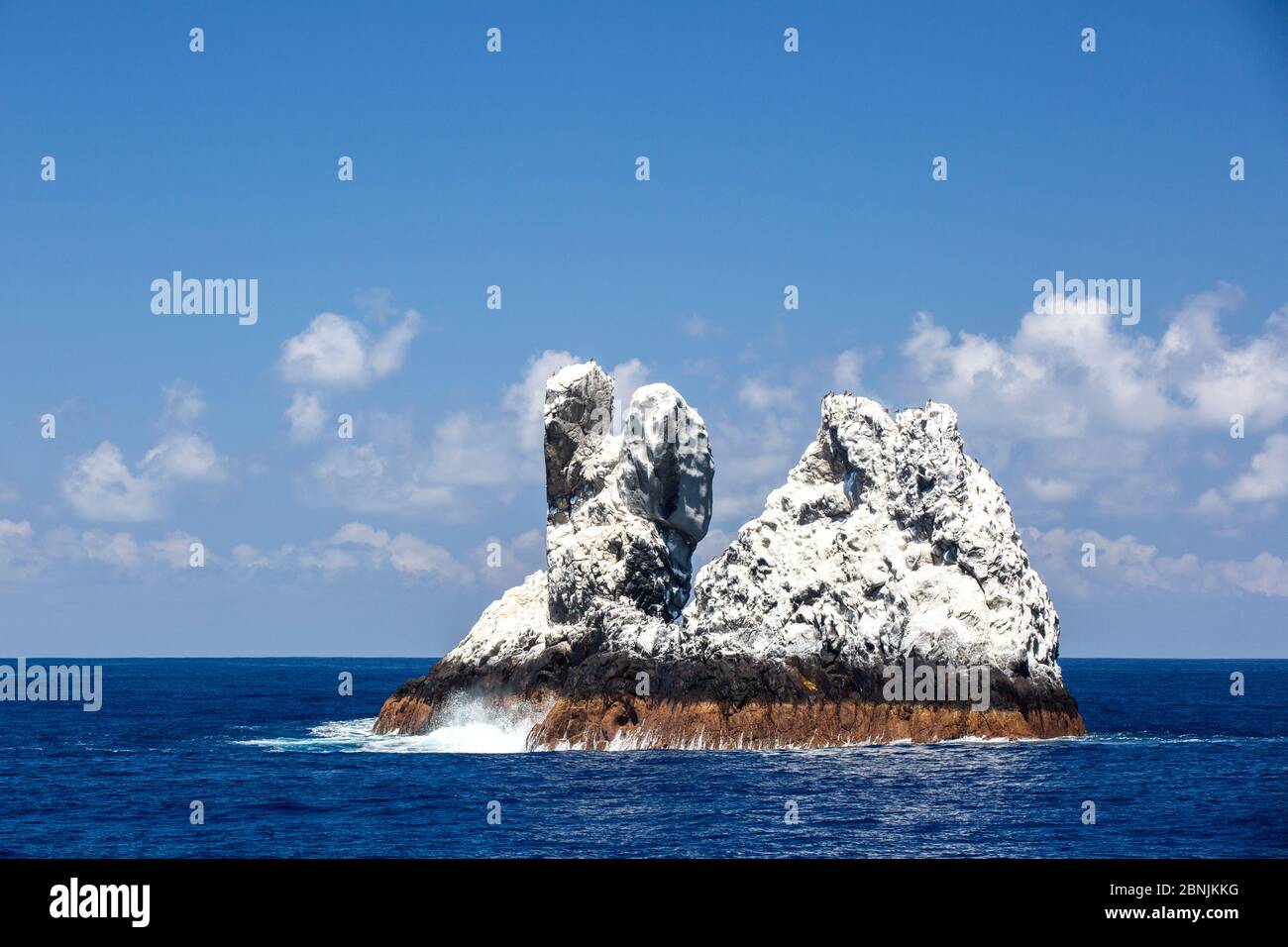 Roca Partida, a small rock island covered in white bird guano in the ...