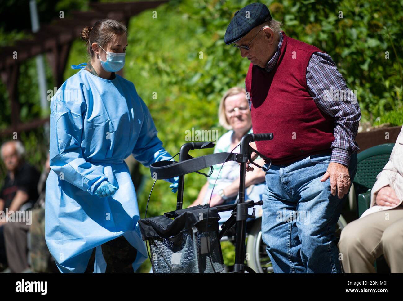 Solingen, Germany. 15th May, 2020. A soldier in a disposable smock ...