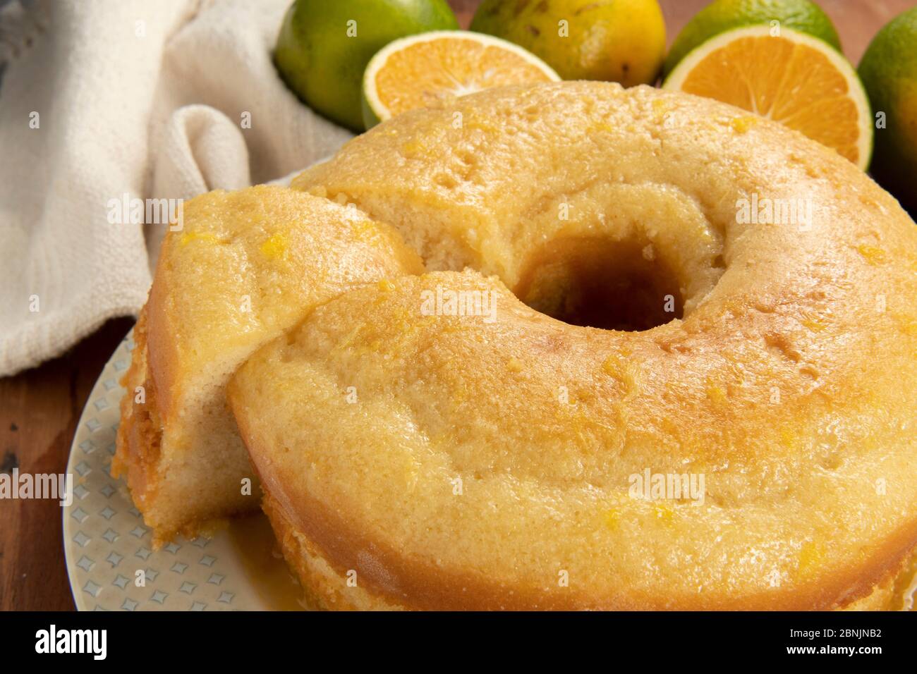 homemade orange cake in round shape with hole Stock Photo - Alamy