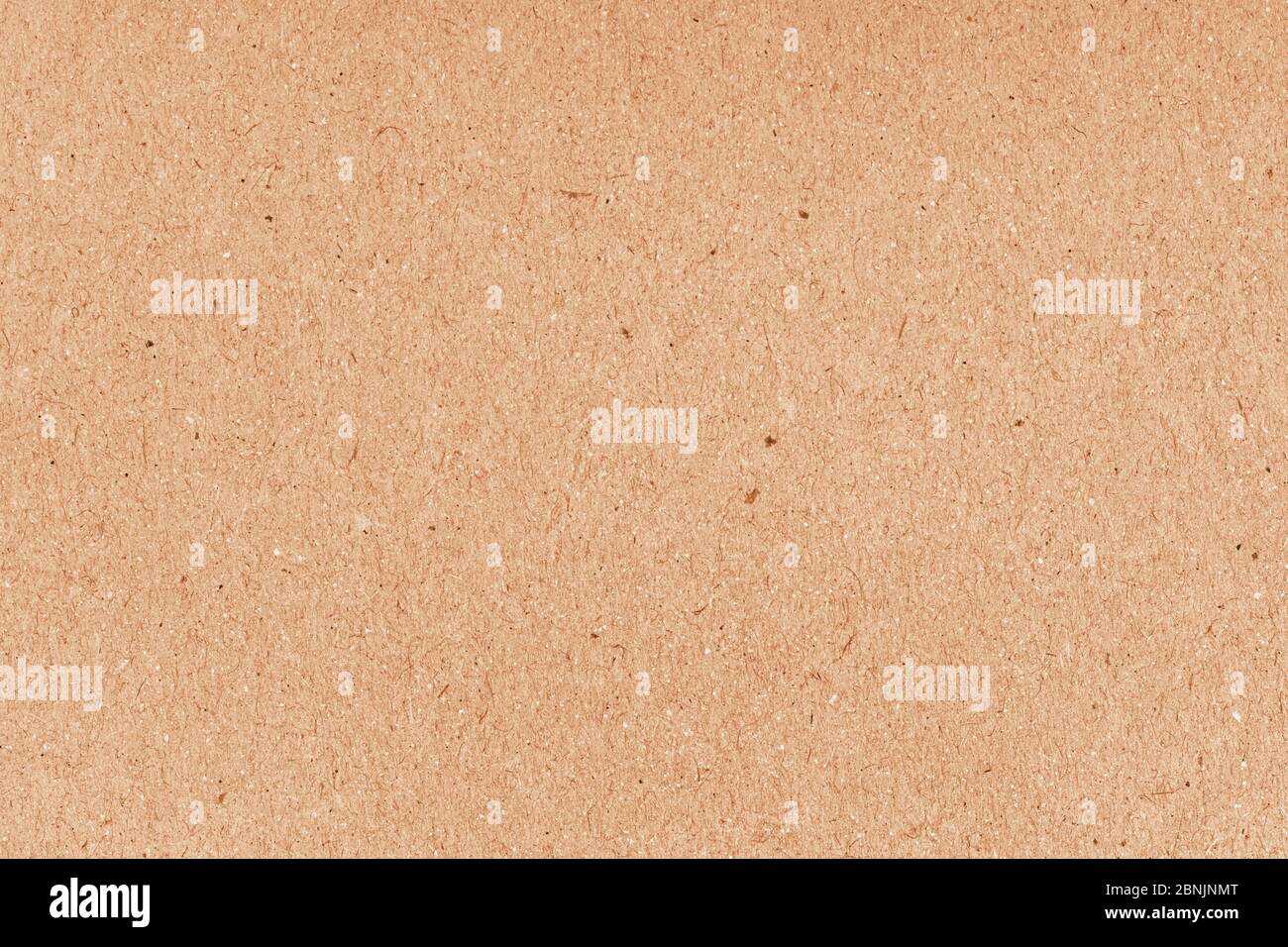 Brown grainy corrugated cardboard surface. Beige carton plain surface ...