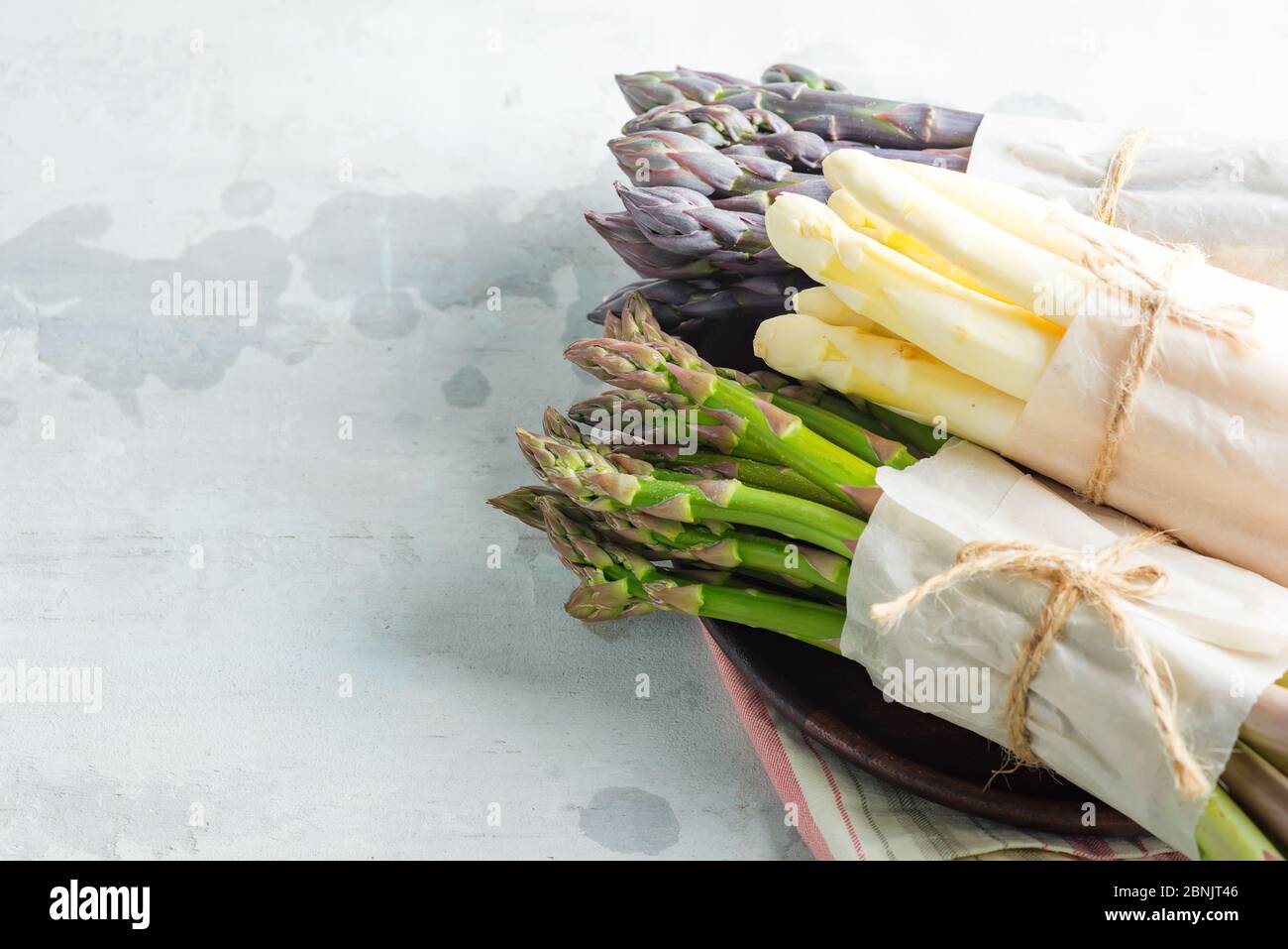 Vegetable border frame from fresh natural organic asparagus spears on a ...