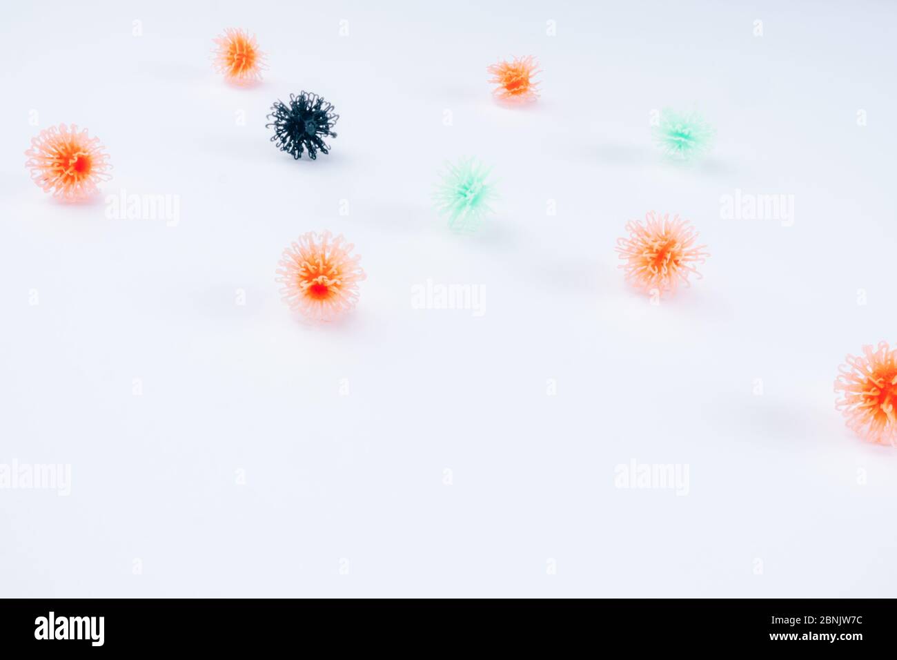 colorful viruses and bacteria on white against a white background ...