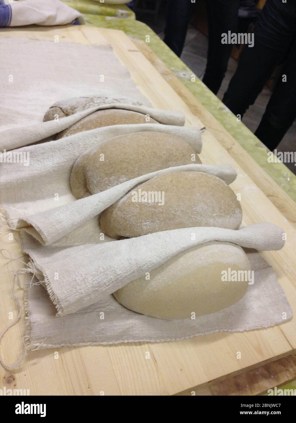 Some loaves of bread ready to be placed in the oven Stock Photo - Alamy