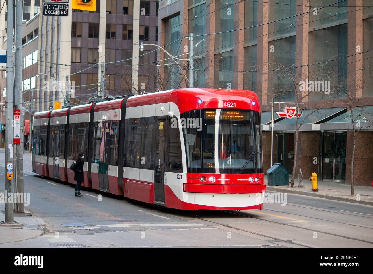 TTC (Toronto Transit Commission) street car westbound on Queen Street ...