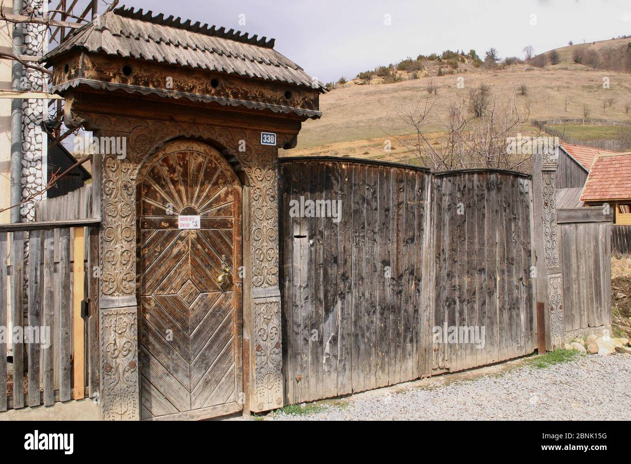 Covasna County, Romania. Traditional wooden gate decorated by local ...