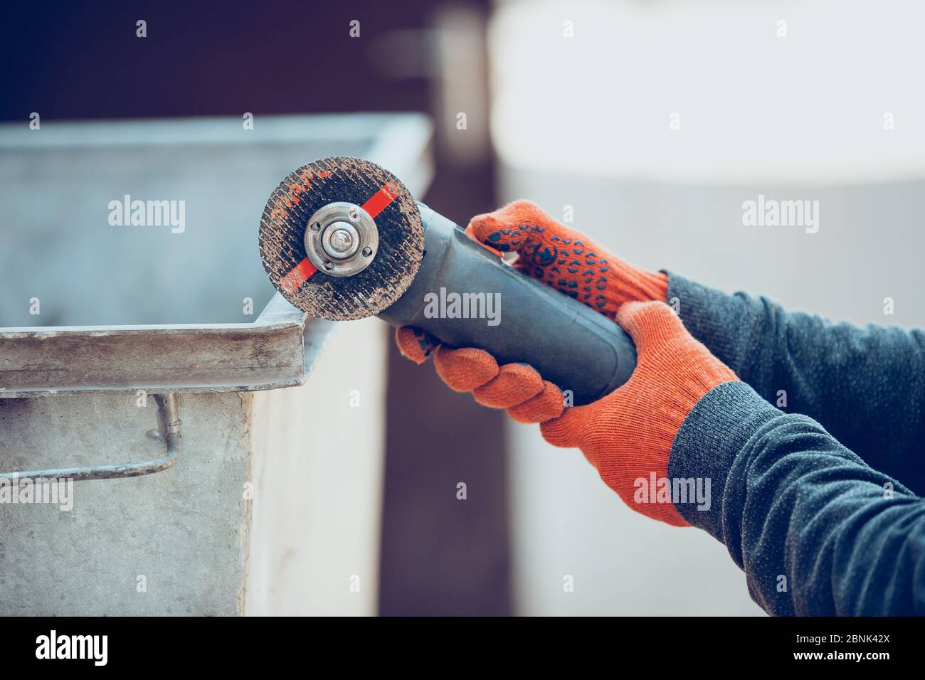 Closeup of repairman in uniform, professional builder working using ...