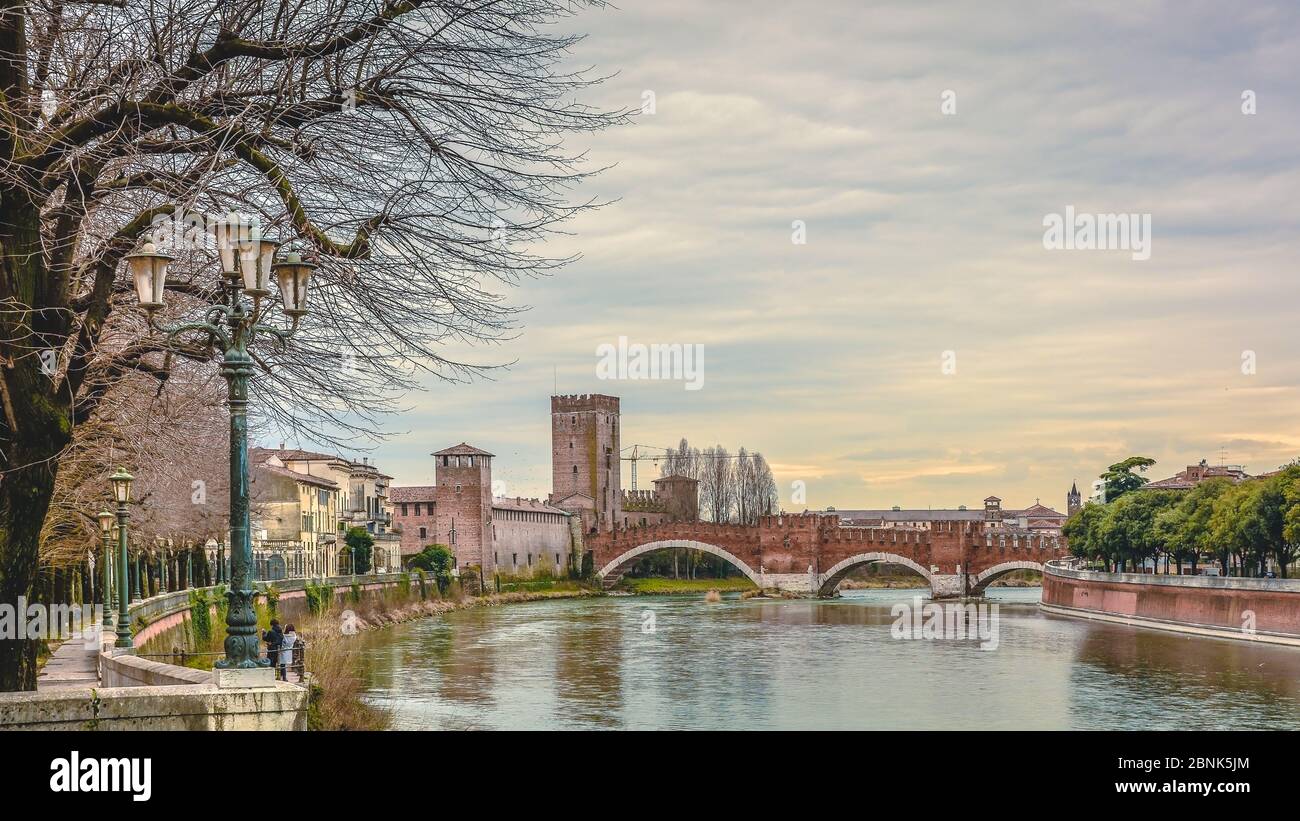 Verona cityscape: panoramic view of Adige River and old building ...