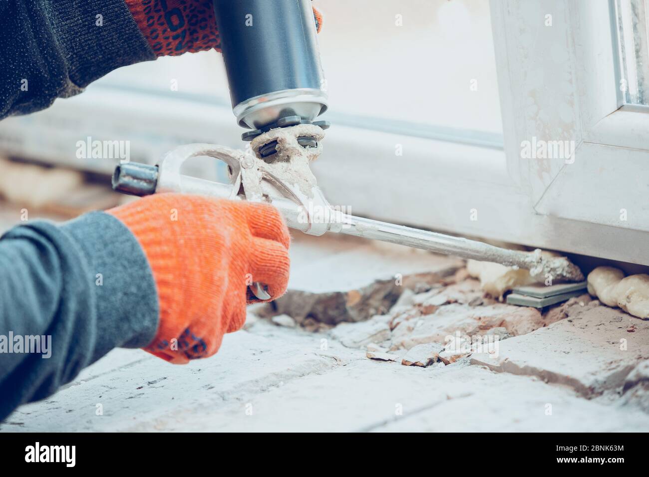 Closeup of repairman in uniform, professional builder working using ...