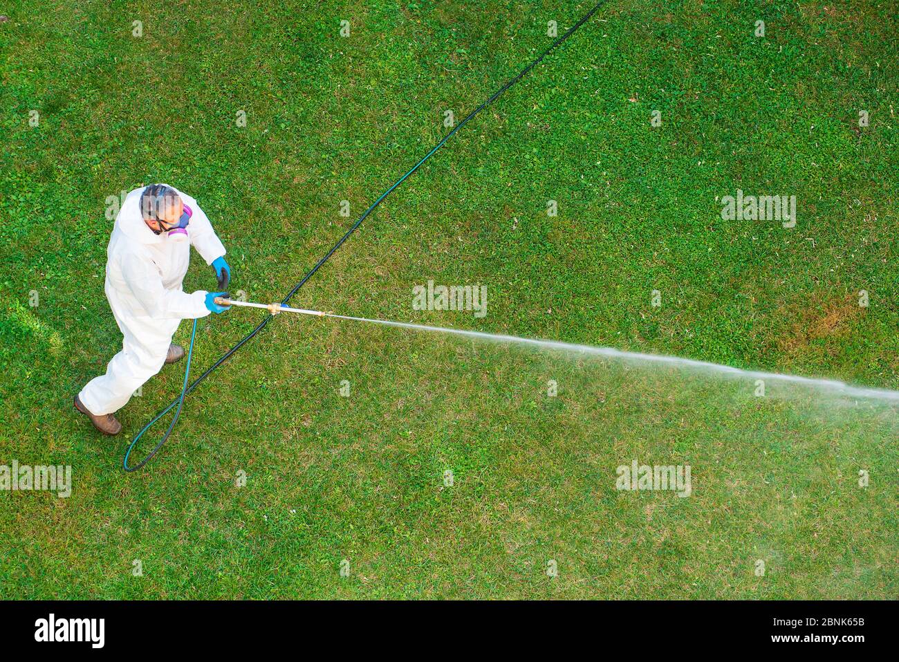 Worker Spraying Insecticide Stock Photo - Alamy