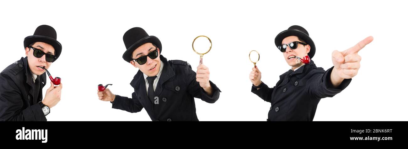 The young detective in black coat holding magnifying glass isolated ...