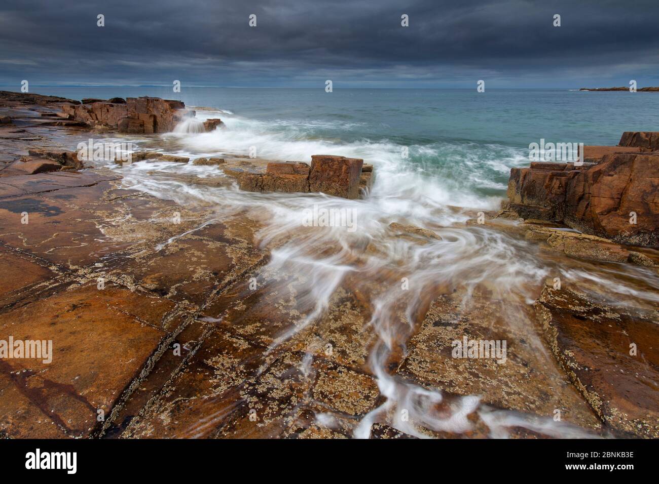 Waves washing over sandstone rocks, Hopeman, Moray, Scotland, UK ...