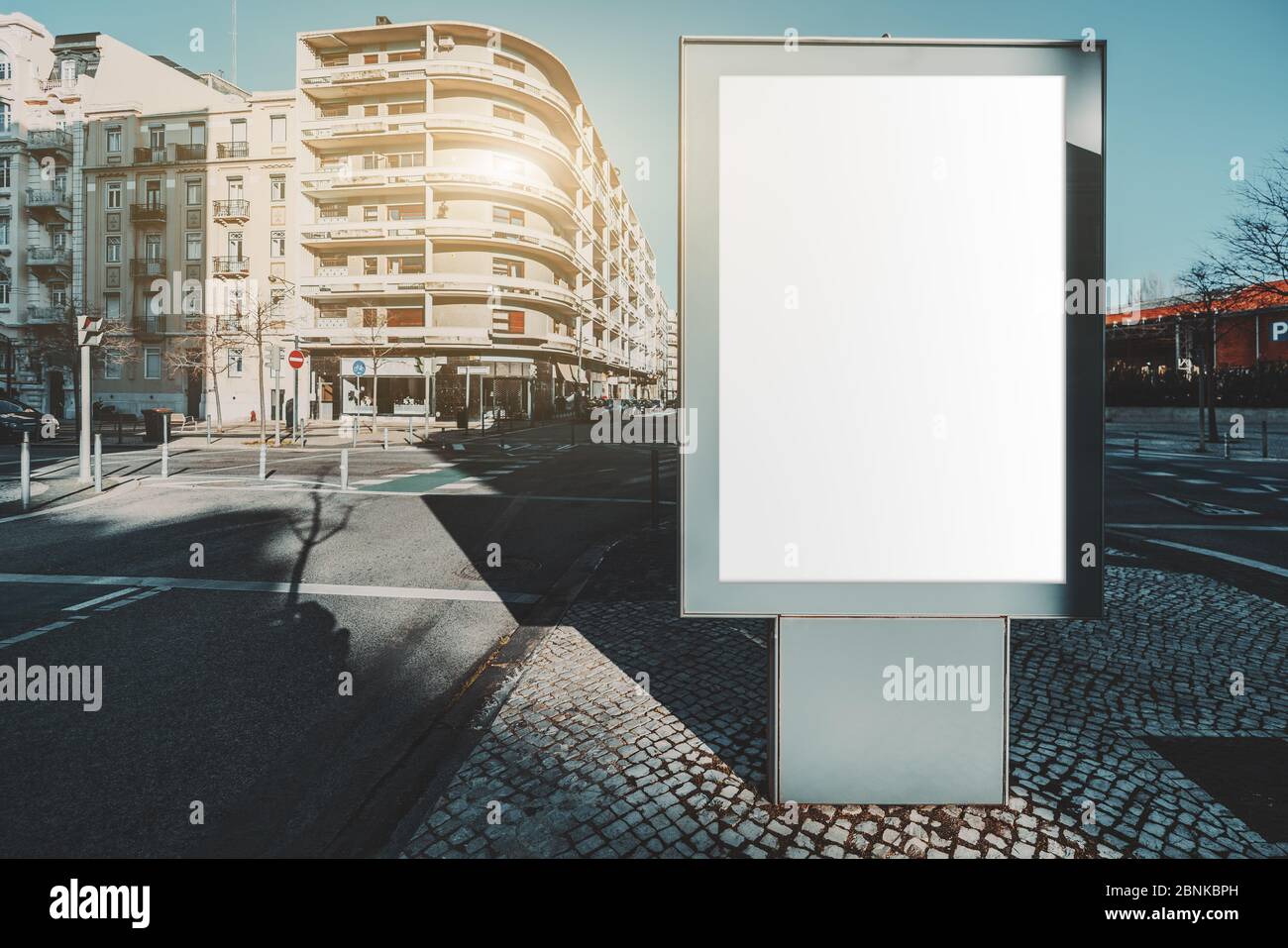 Mockup of empty information poster in urban settings near urban roads ...