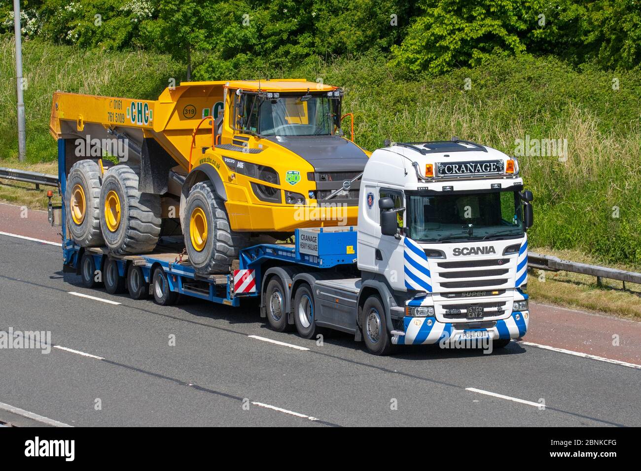 Cranage Haulage delivery trucks, lorry carrying Volvo A40G, Articulated ...