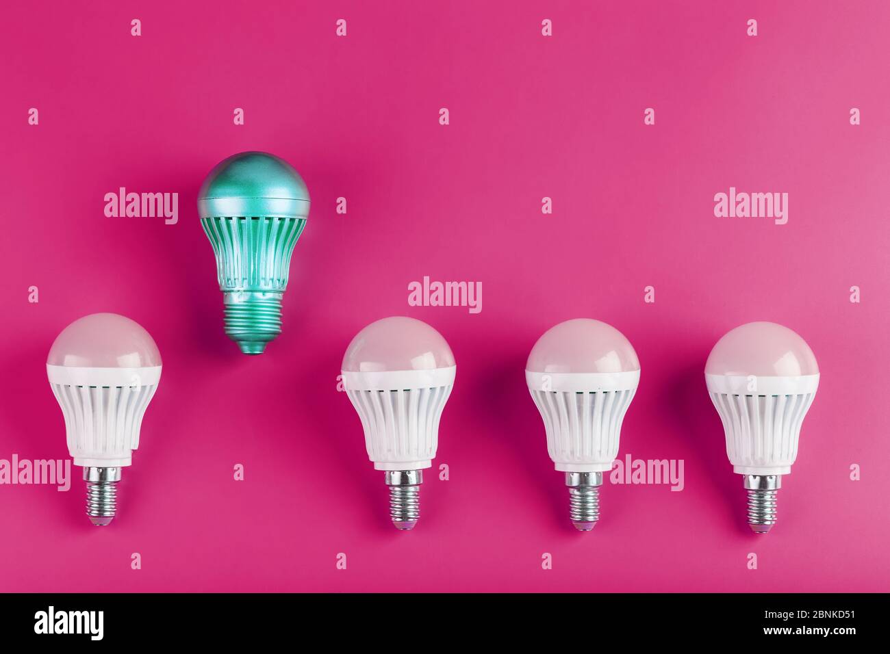 A special Light bulb stands out from the group of ordinary white light ...