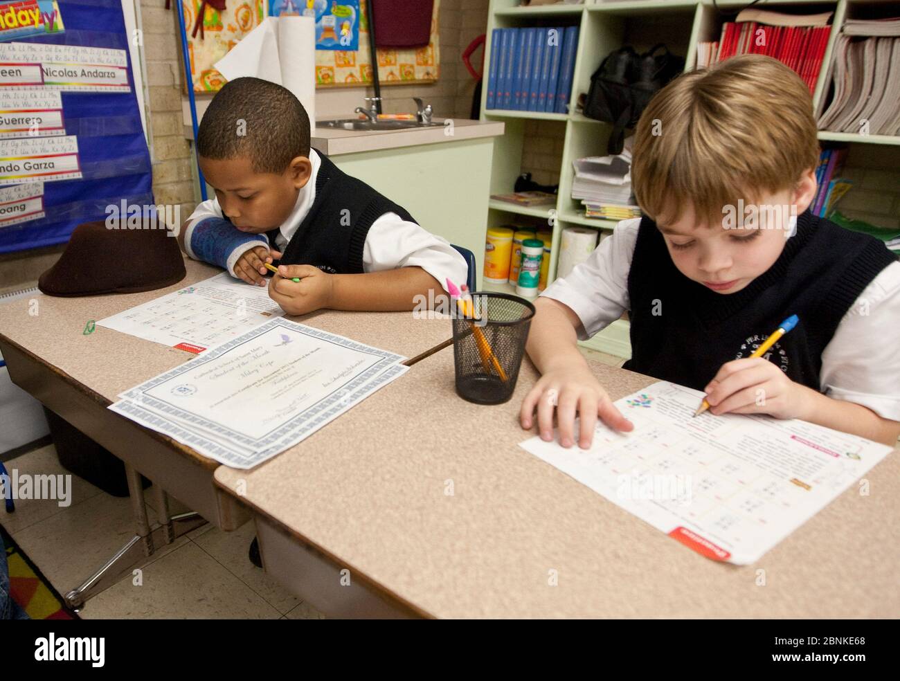 Austin Texas USA, January 2013: Second-grade boys wearing uniforms use ...