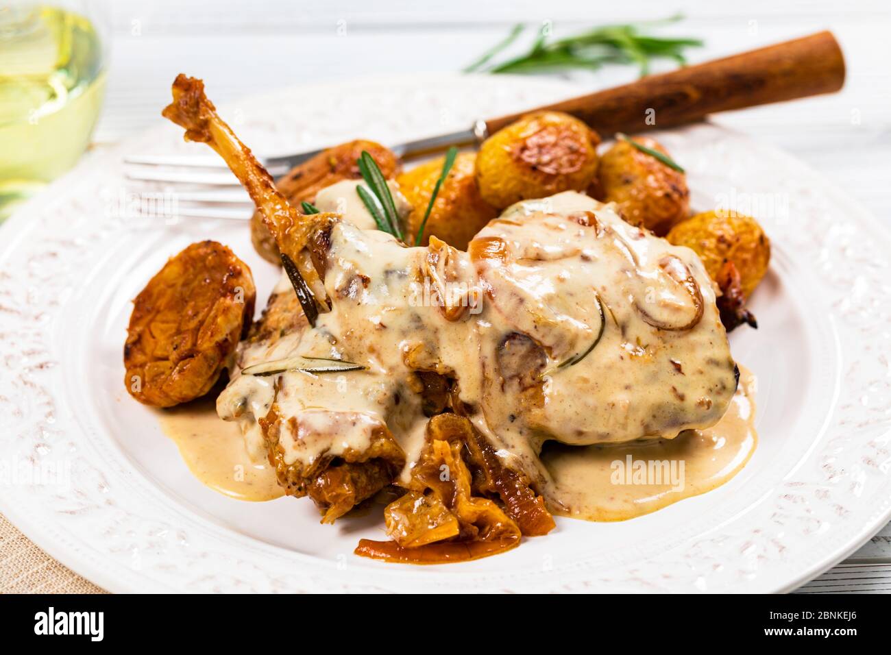 Fried Rabbit Meat With Rosemary in Sour Cream Sauce and Potato Stock ...